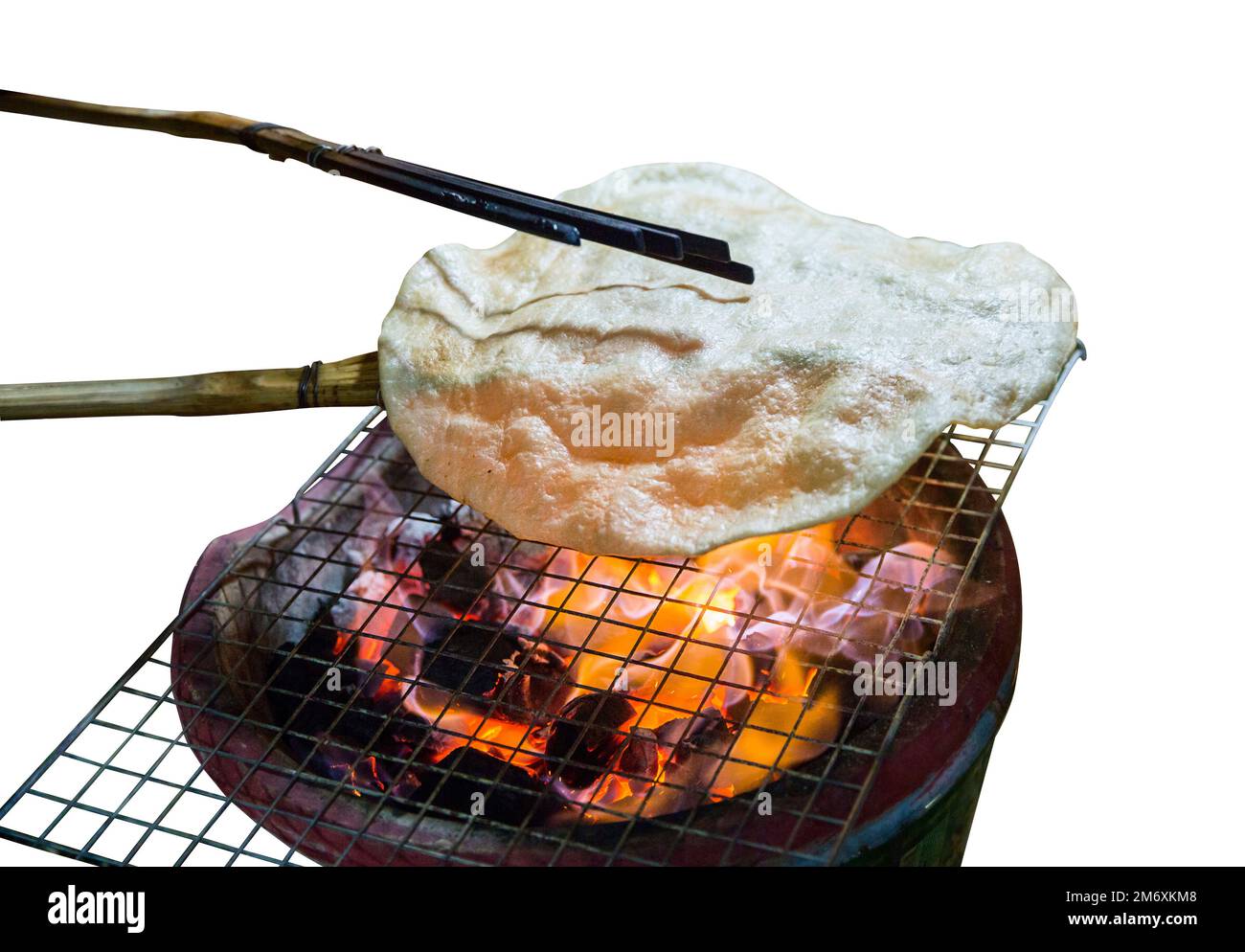 Die cut of Kite cracker snack on the charcoal grill on white isolated ...