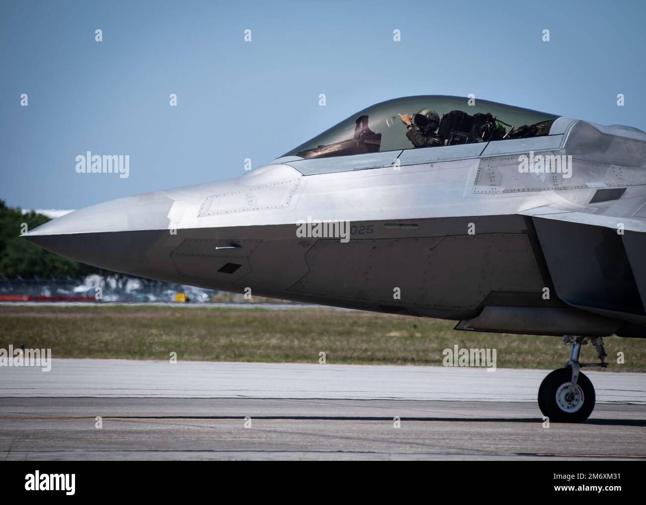 A U.S. Air Force pilot prepares for takeoff in a F-22 Raptor assigned ...