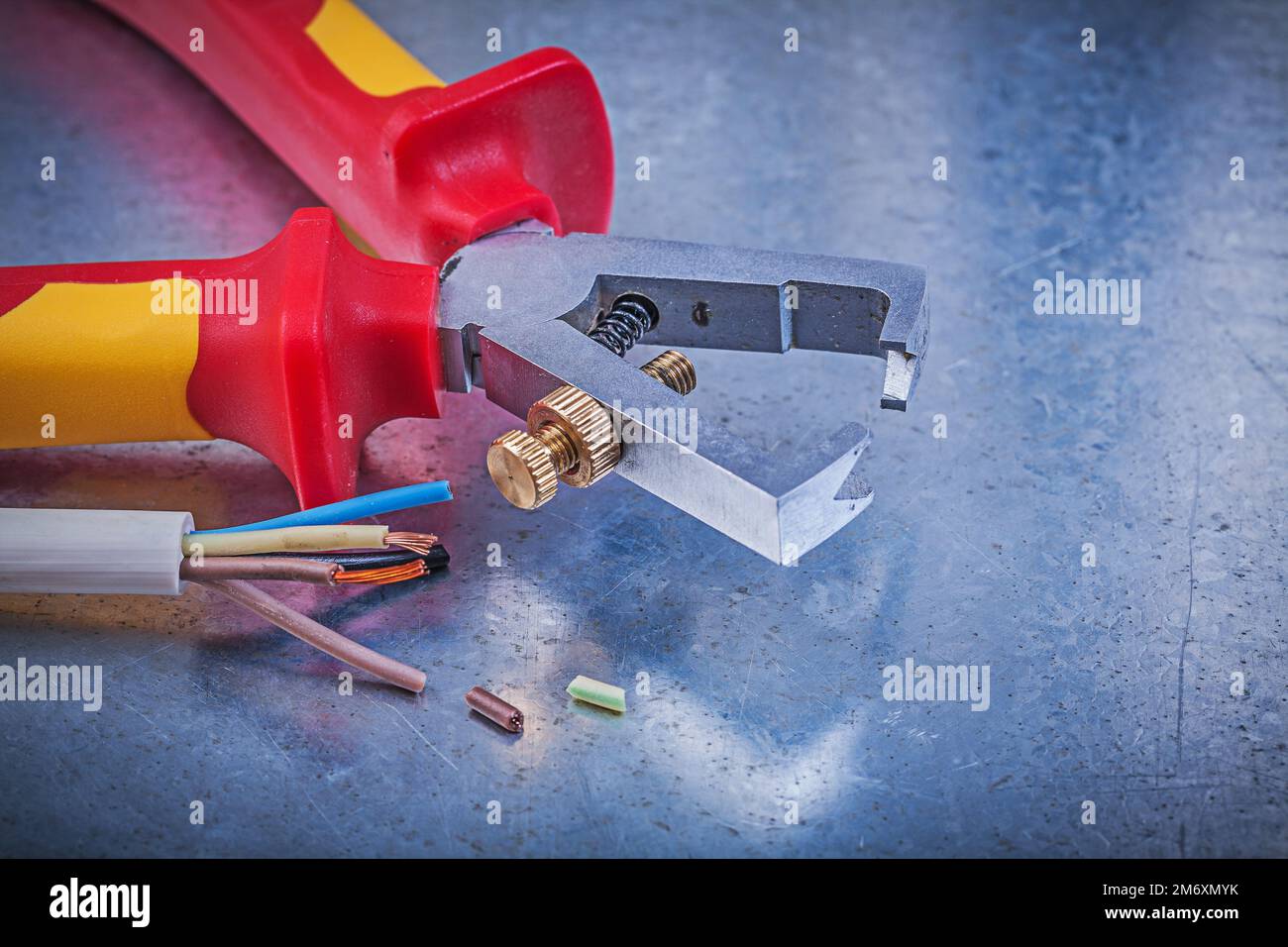 Insulation strippers electric wires on metallic background electricity ...