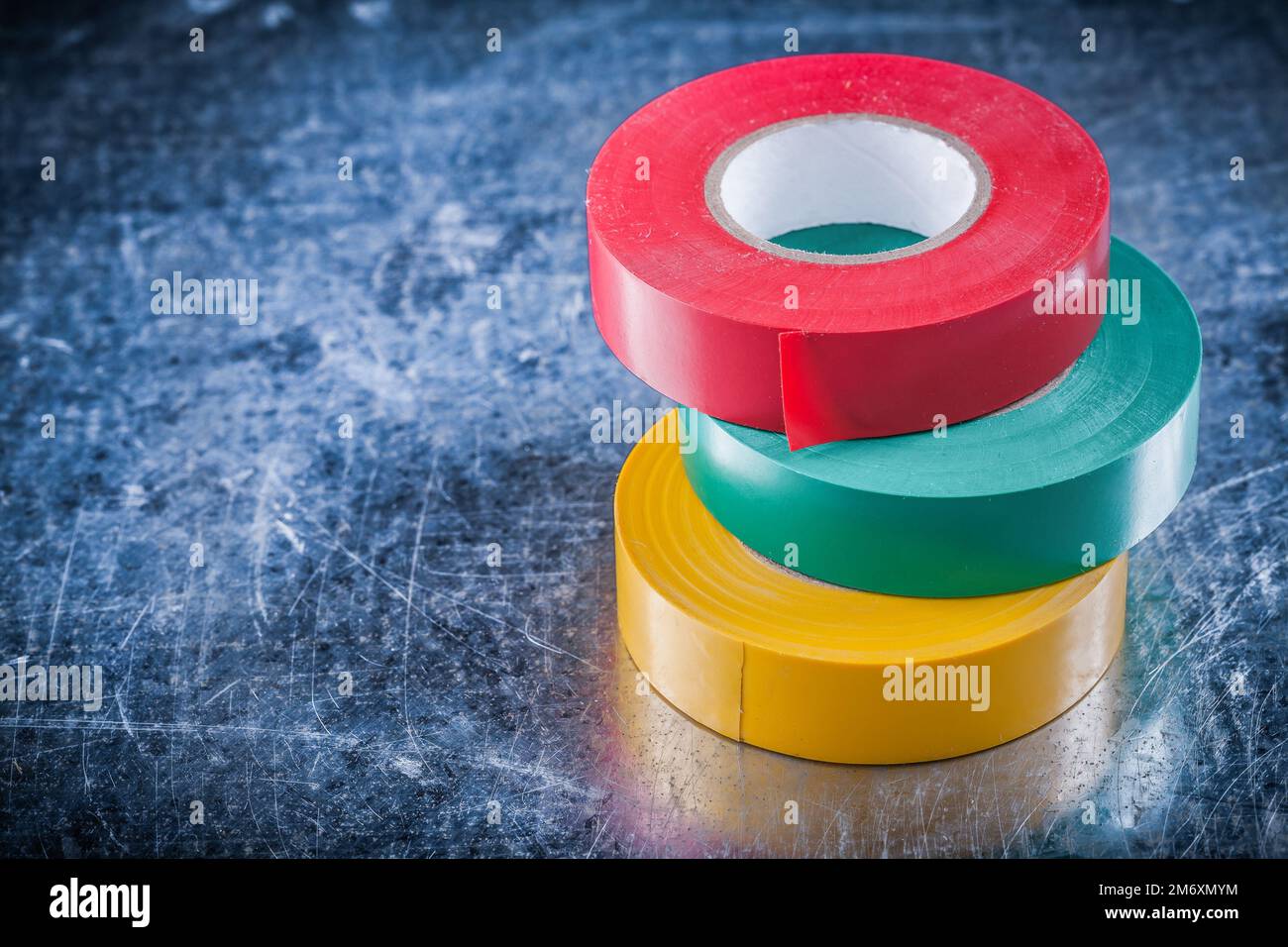 Insulating tapes on scratched metallic background electricity concept ...