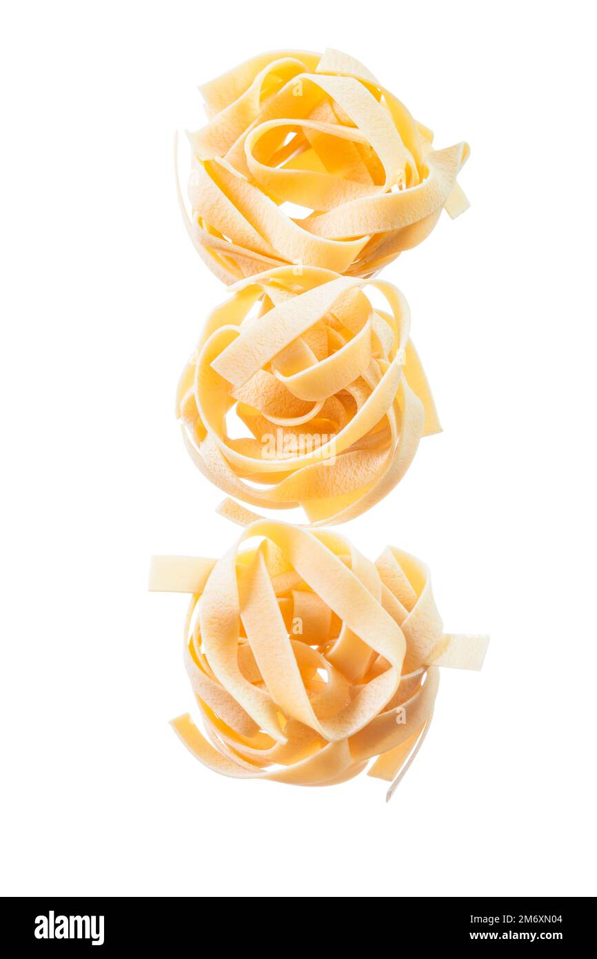 Italian raw pasta isolated on white Stock Photo - Alamy