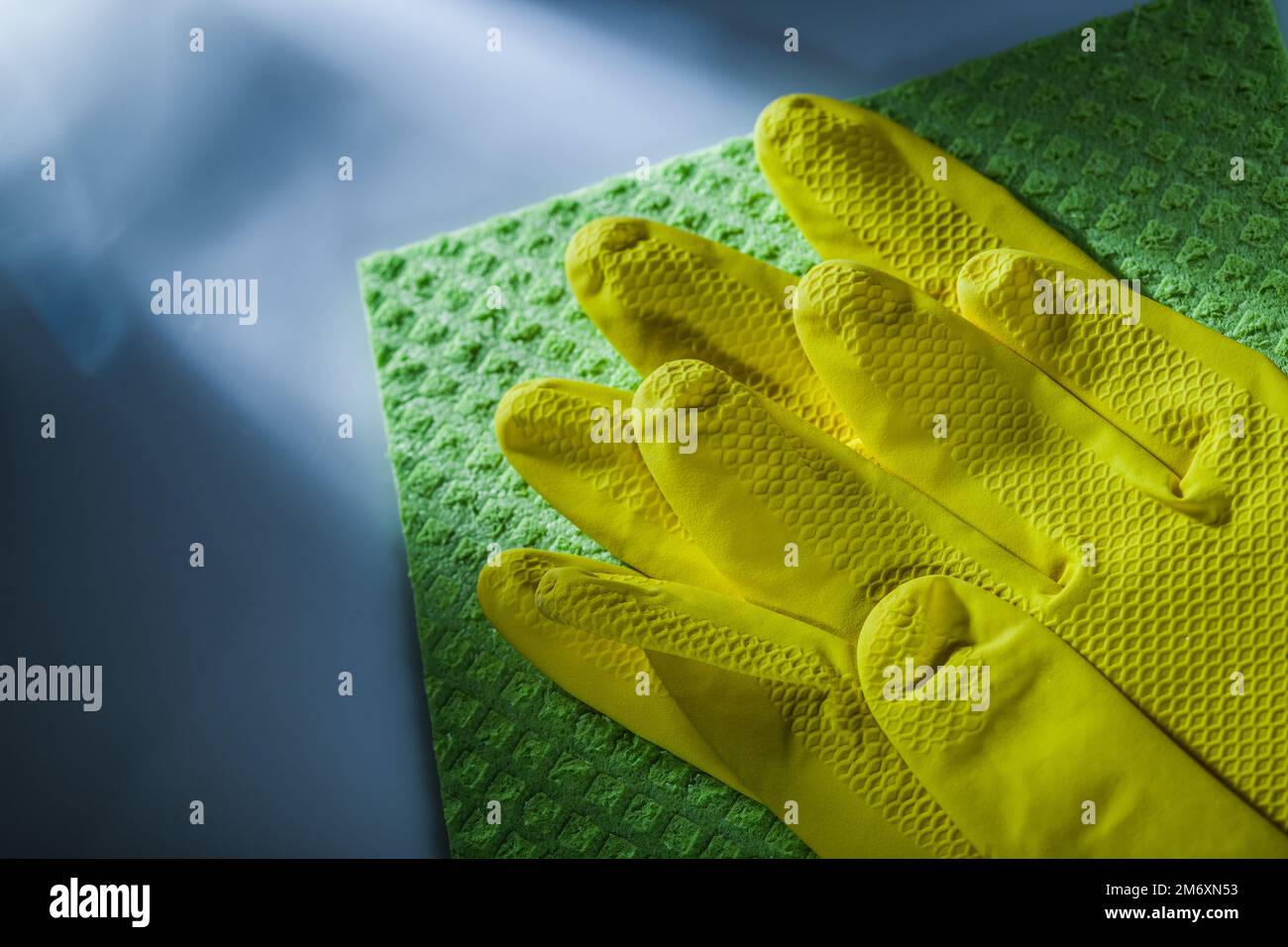 Kitchen dishwashing cloth safety gloves on white background Stock Photo ...