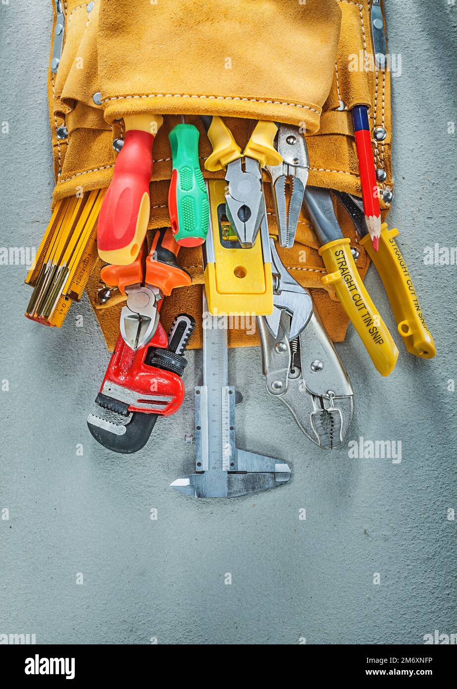 Leather tool belt construction tooling on concrete background Stock ...