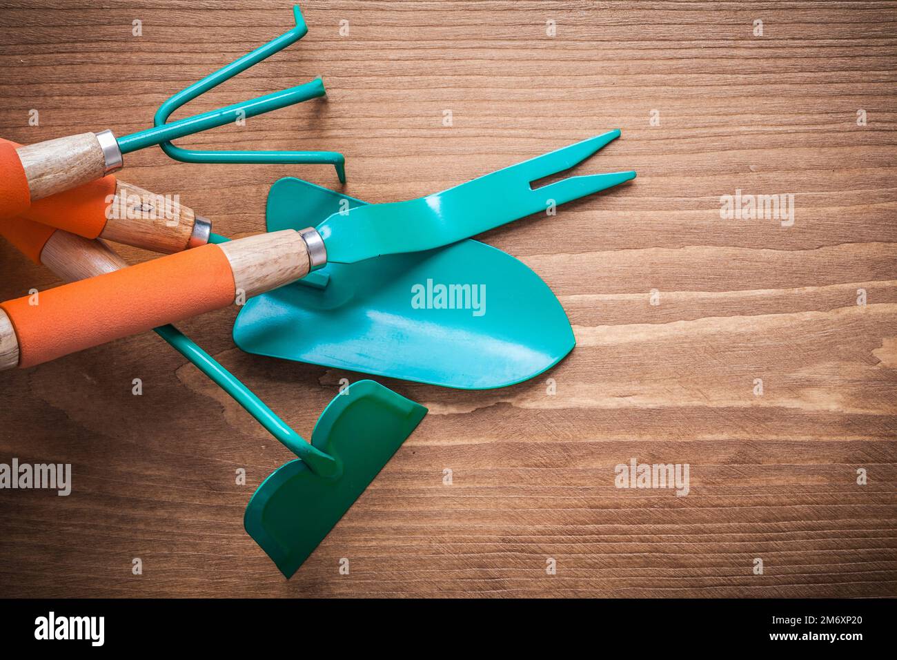 Metal gardening hoe weeding chisel trowel and rake agriculture concept ...