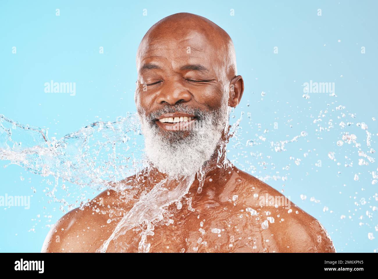 Relax, senior and black man with skincare cleaning routine and satisfied face with water splash ...