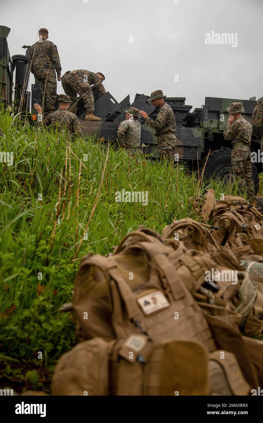 U.S. Marines with Marine Wing Support Squadron (MWSS) 171 set up a live ...