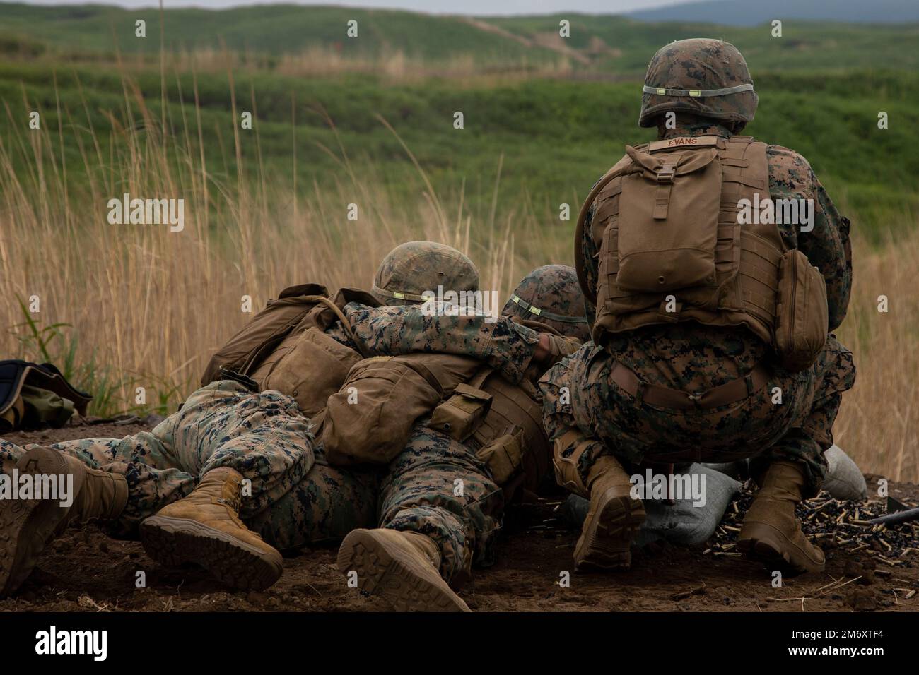 U.S. Marine Corps Sgt. Nikolas Evans (right), a combat engineer with ...