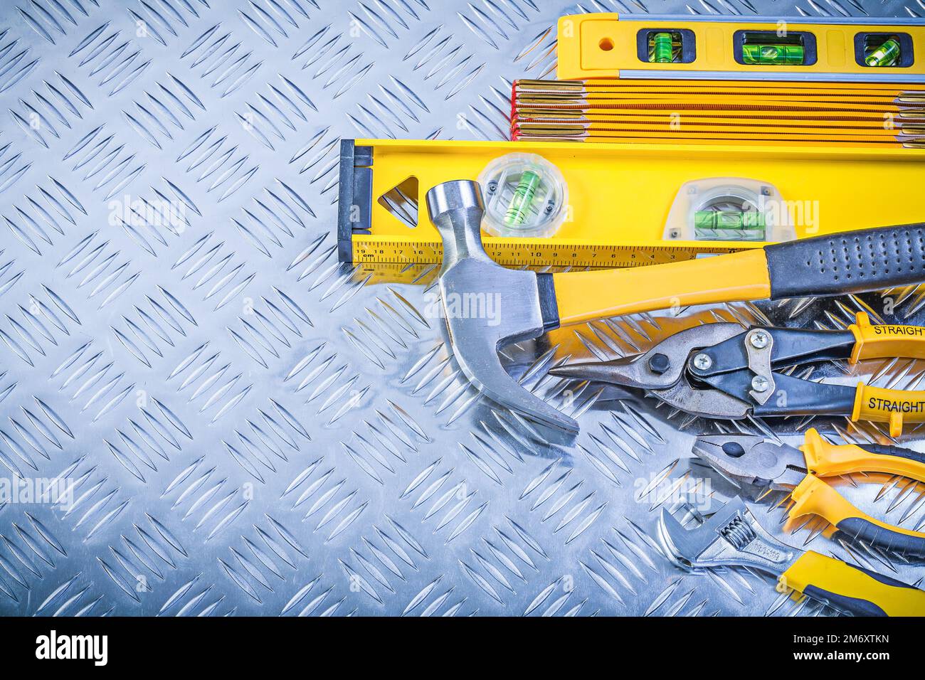 Composition of construction tooling on corrugated metal sheet ...