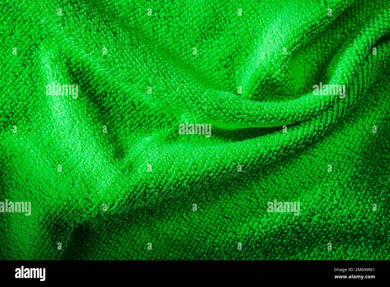 Green kitchen cleaning cloth directly above Stock Photo - Alamy