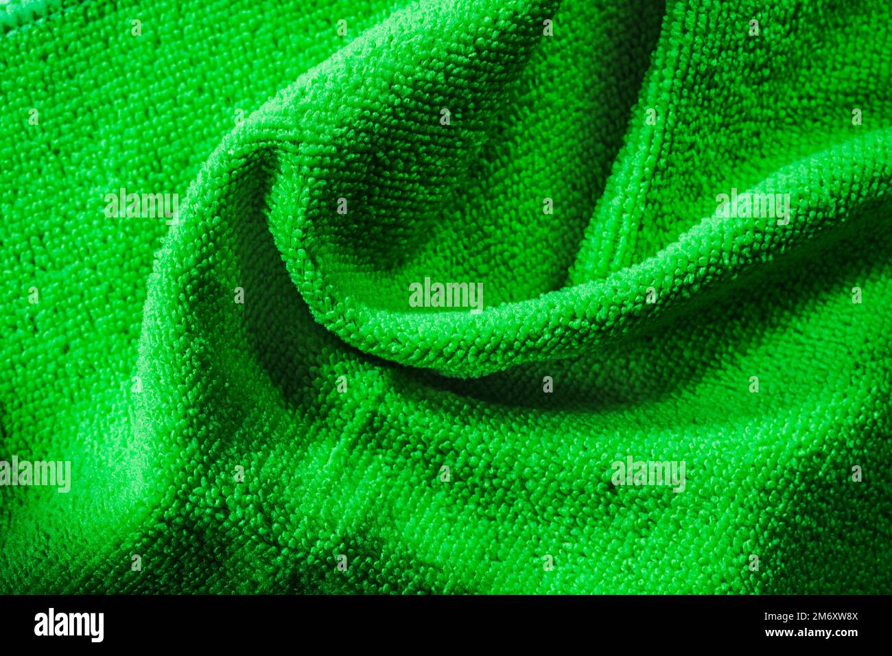 Green kitchen cleaning cloth top view Stock Photo - Alamy