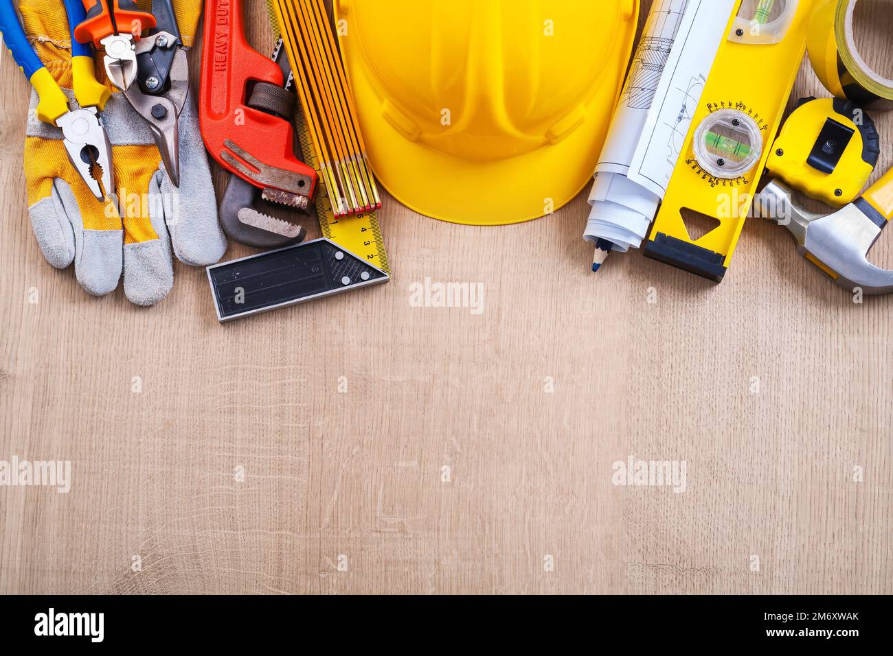 Group of building objects on oak wooden board construction concept ...