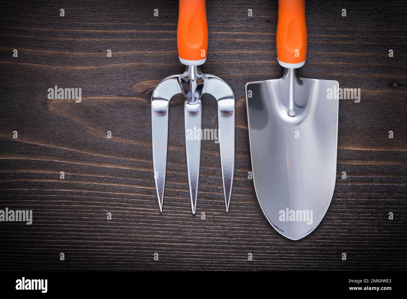 Hand metal spade and trowel fork with handles on vintage hardwood ...