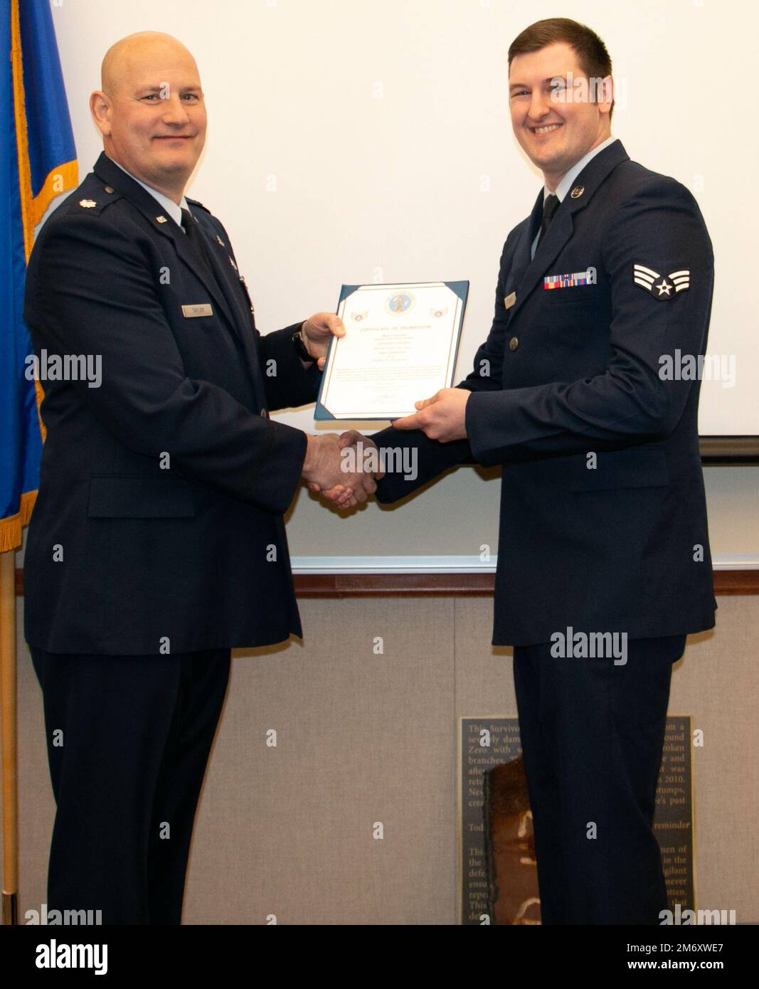 Staff Sgt. Logan Stuckey, right, was promoted at a recent ceremony held ...