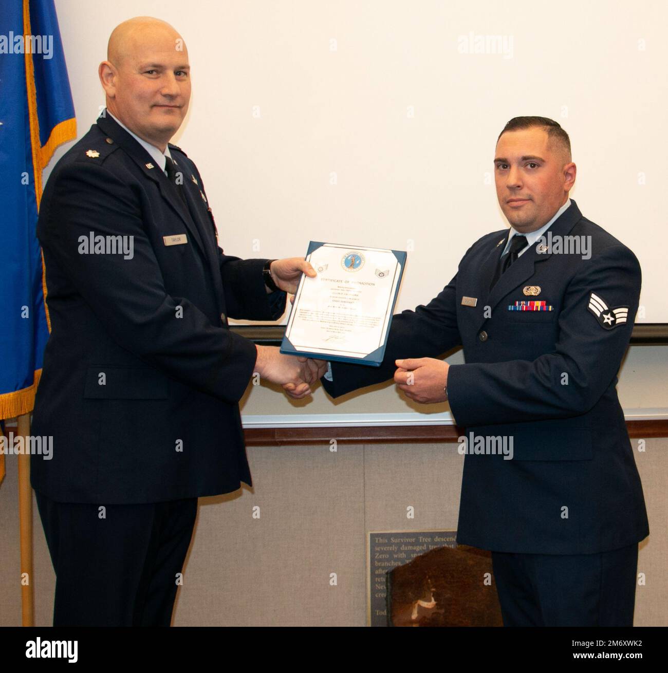 Staff Sgt. Jason Calandra, right, was recently promoted during a ...