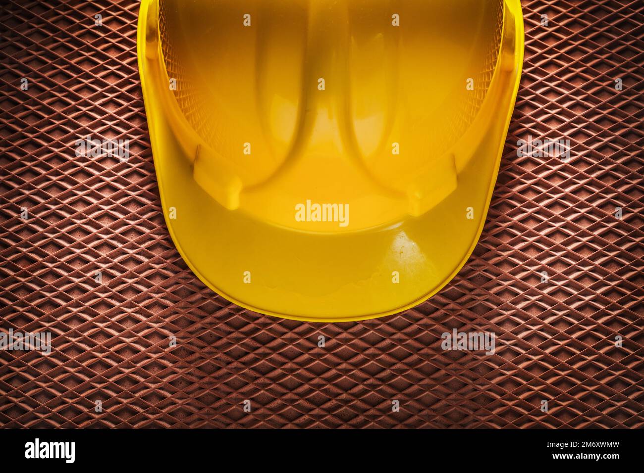 Hard hat on dielectric rubber matting Stock Photo - Alamy