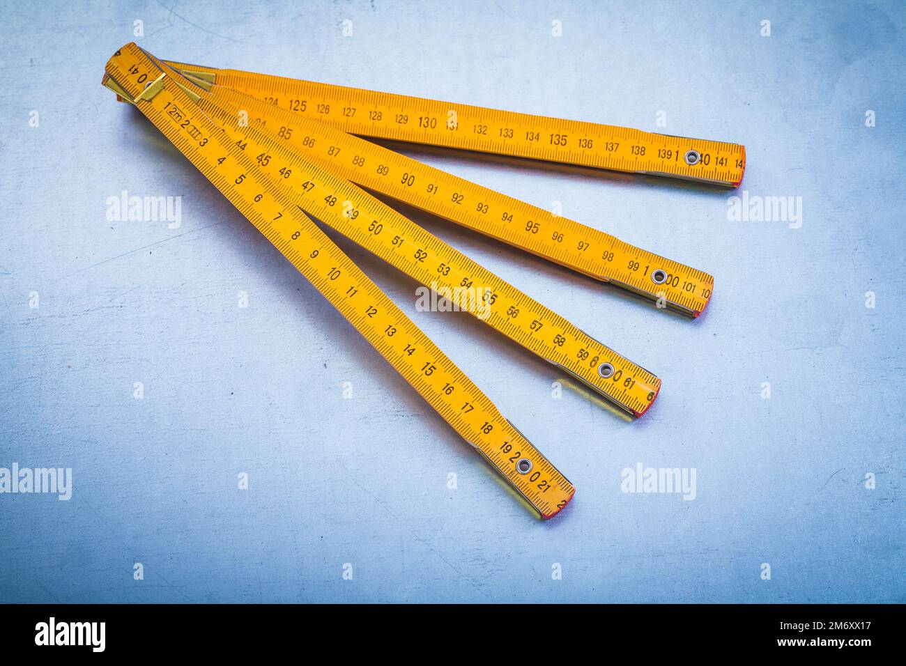 Horizontal version of wooden meter on metallic background construction ...