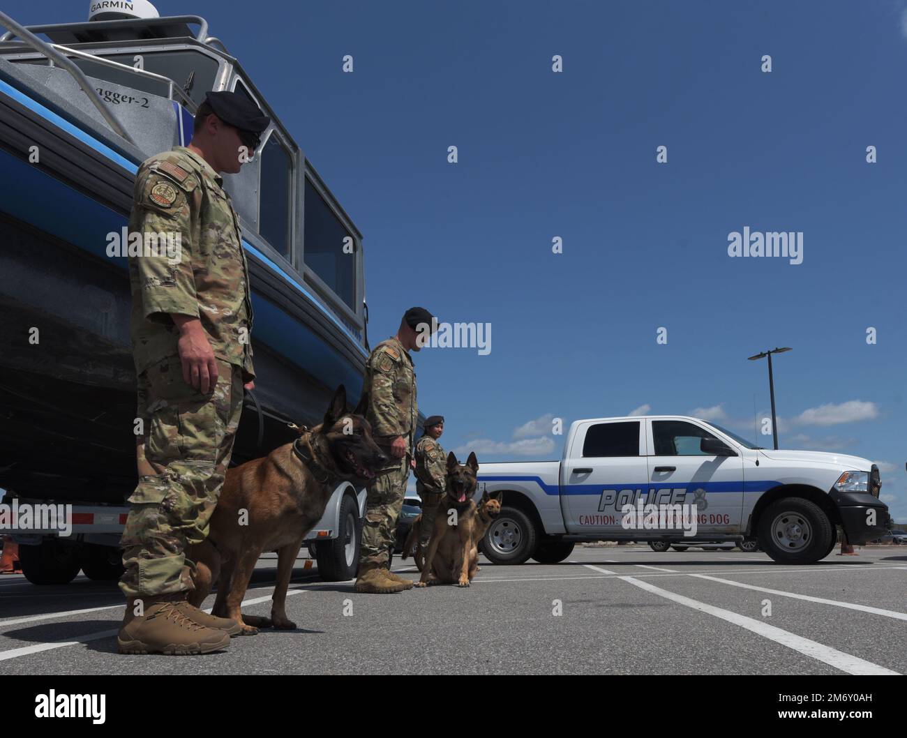 U.S. Airmen with the 325th Security Forces Squadron and their military working dog counterparts ...