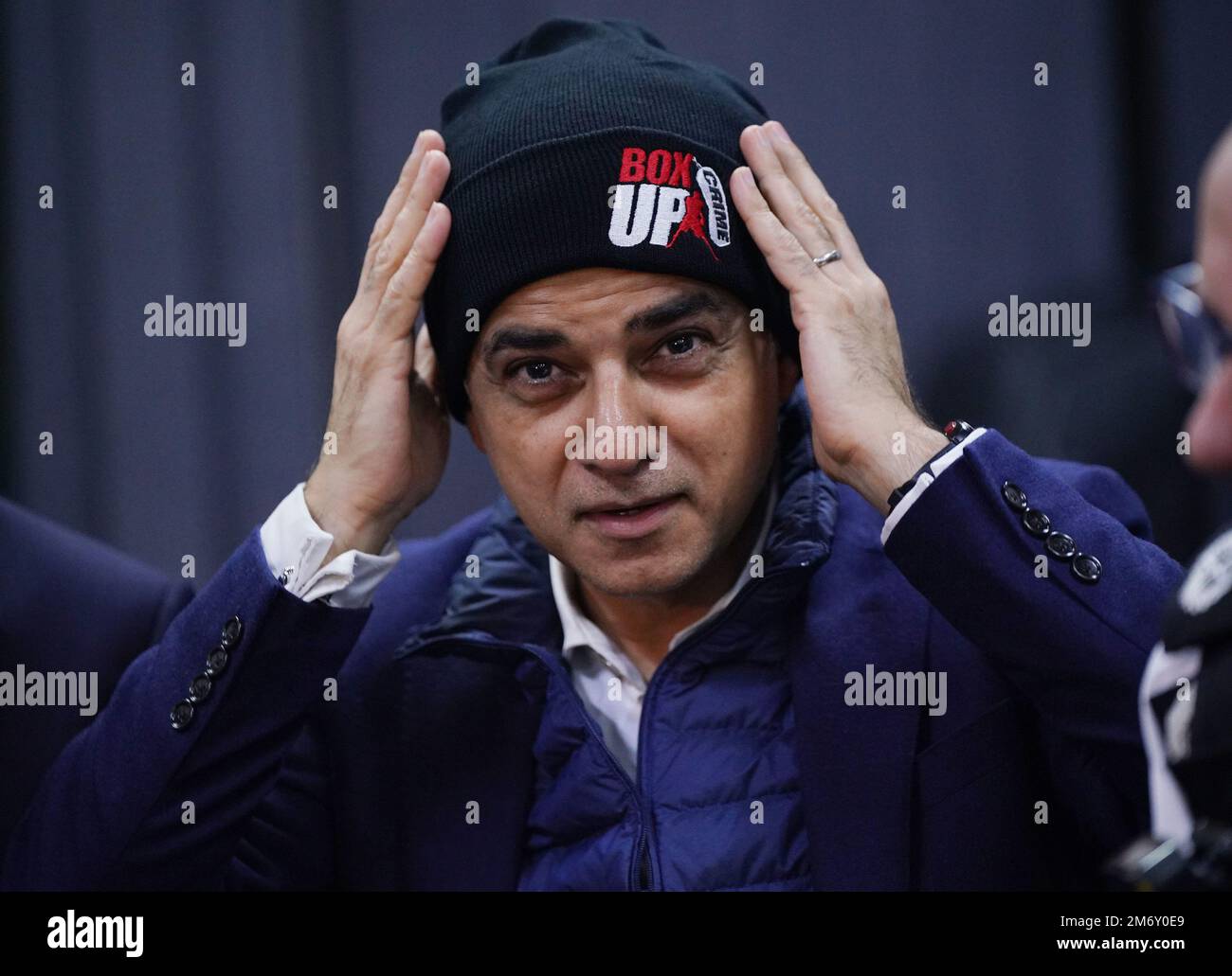 Mayor of London Sadiq Khan wears a hat he received as a gift during his ...
