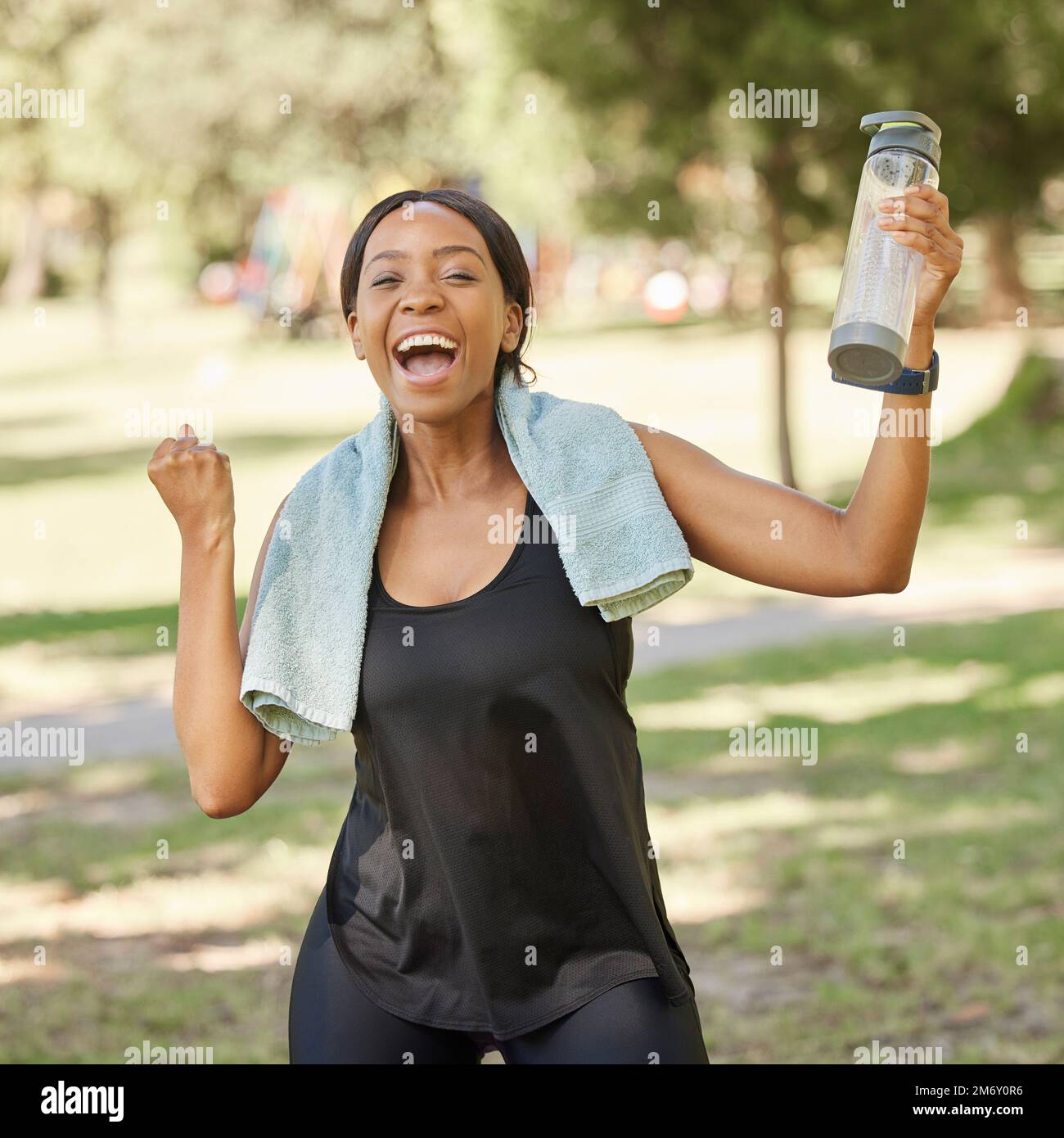 Fitness, excited and portrait of a black woman in nature for ...