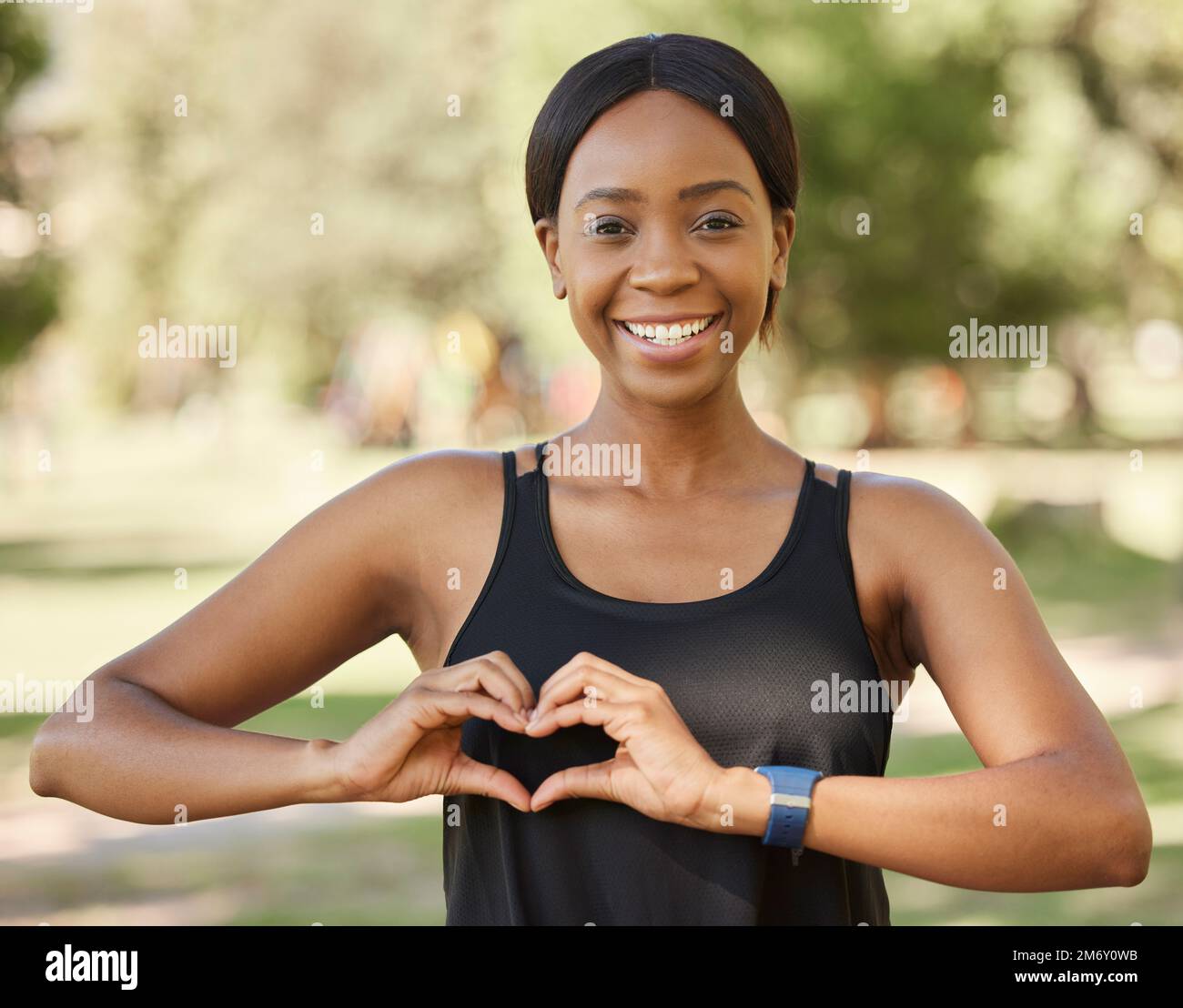 Nature, fitness or black woman portrait with heart hand sign loves training, exercise, outdoor ...