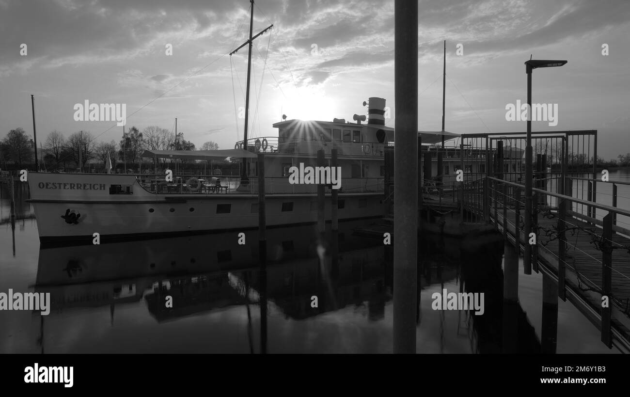Sun rays over Historic ship Austria in Bregenz on Lake Constance with ...
