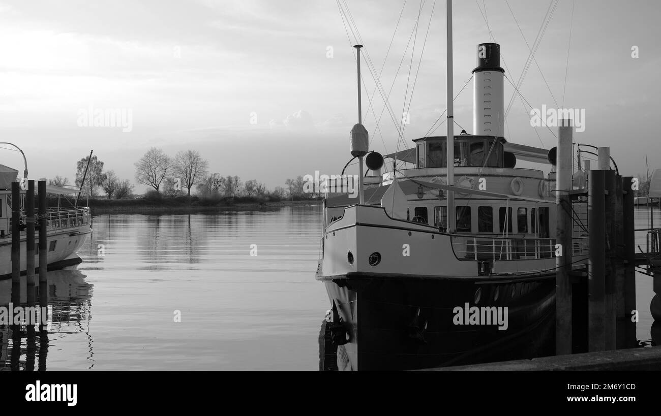 Historic ship on Lake Constance in Hard, Bregenz, Austria in black and ...
