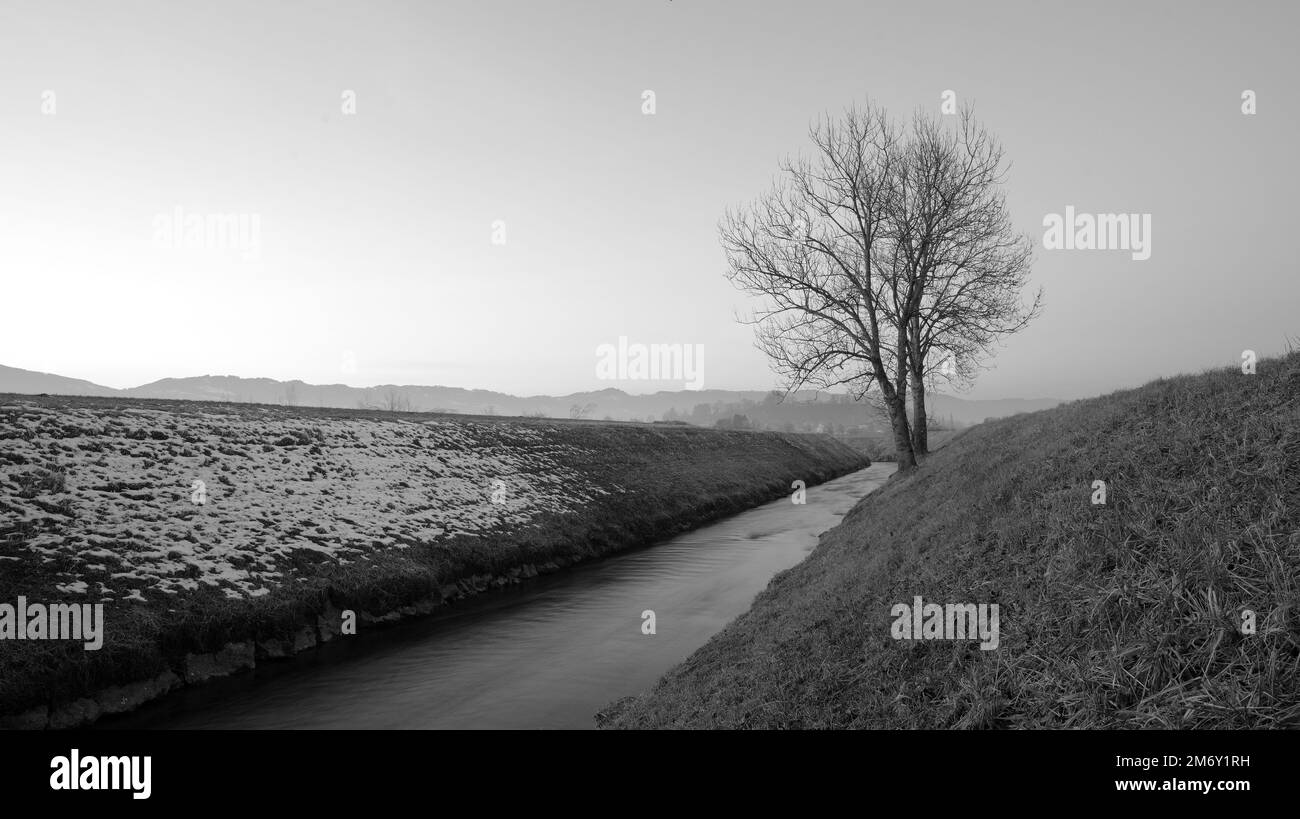 Sunset on soft water Black and White Stock Photos & Images - Alamy