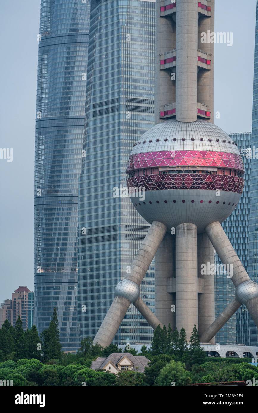 An aerial view of Oriental Pearl TV Tower and skyscrapers in the ...