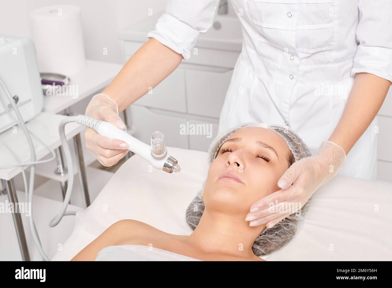 Beautician makes facial gas liquid oxygen serum epidermal peeling for ...