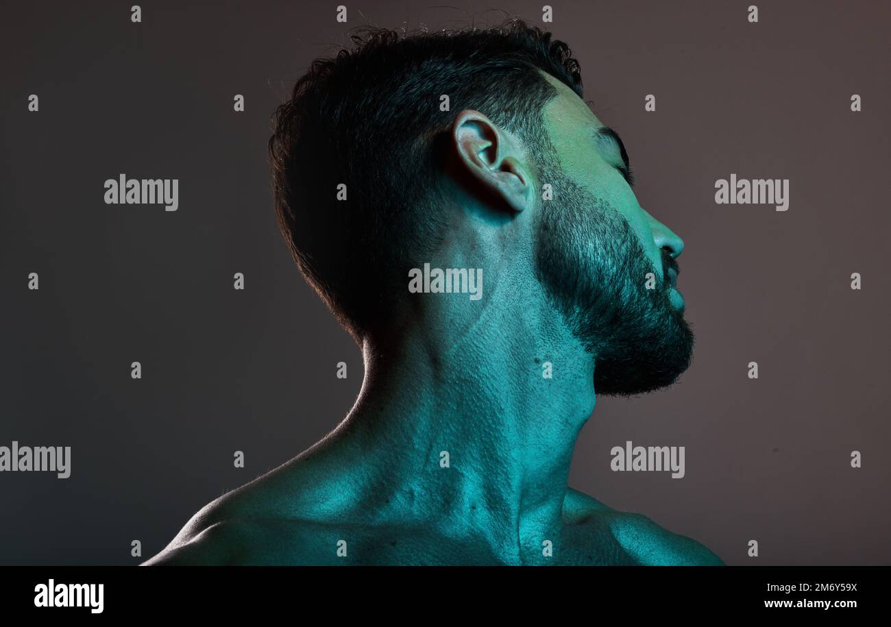 Skincare, beauty and man with neon lights in studio for cosmetics ...