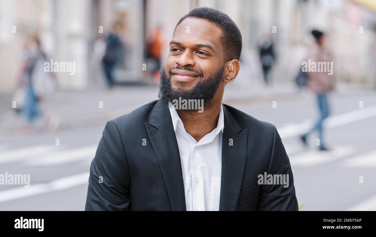 Closeup portrait bearded ethnic man employer dreaming thinking outdoors ...