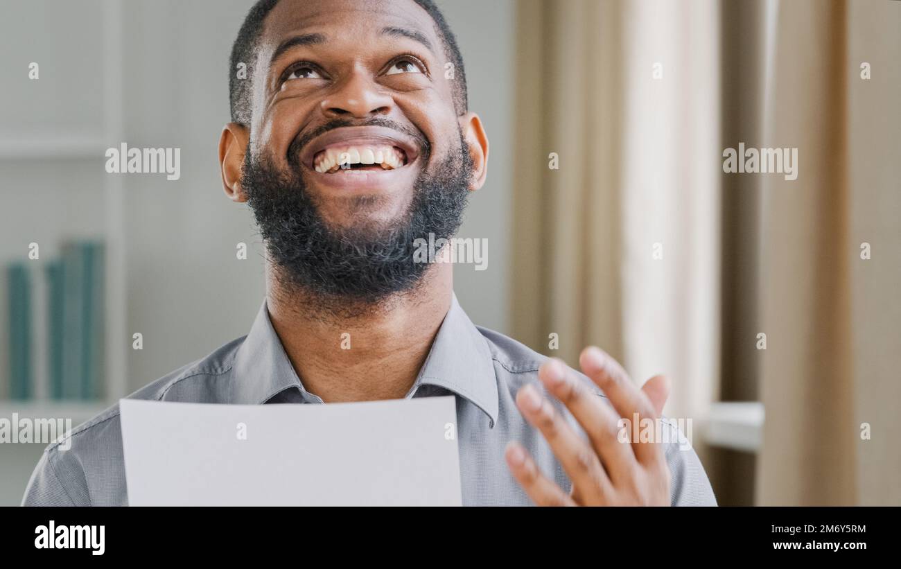 Happy ethnic winner office worker African businessman ethnic bearded ...