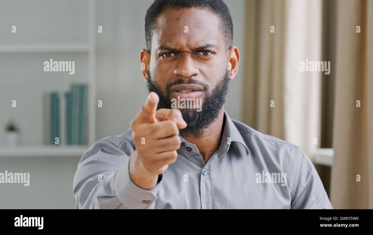 Mad angry aggressive bearded African American businessman professional ...