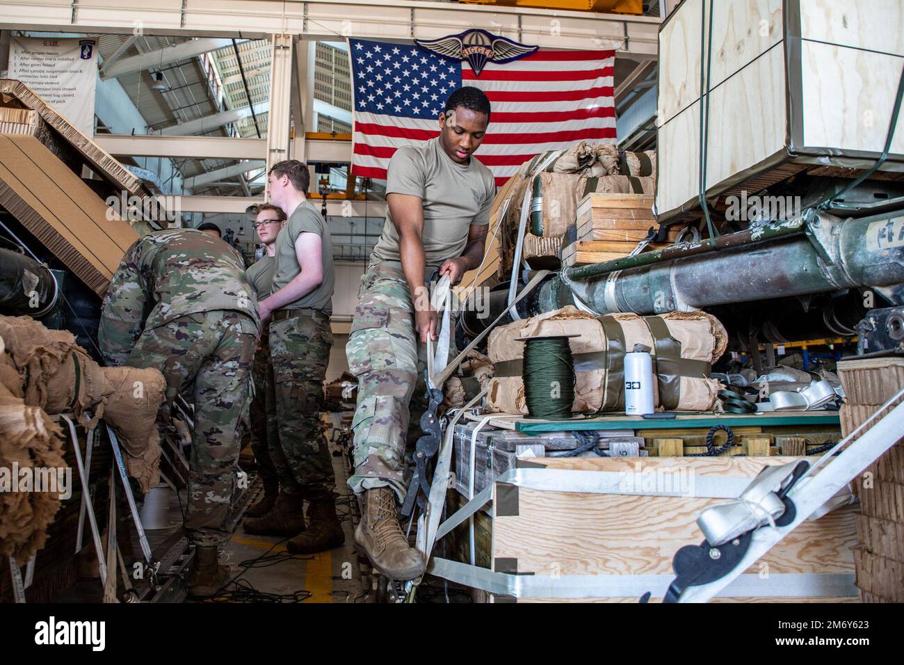 Soldiers from 173rd Airborne Brigade secure a M119 Howitzer and a ...