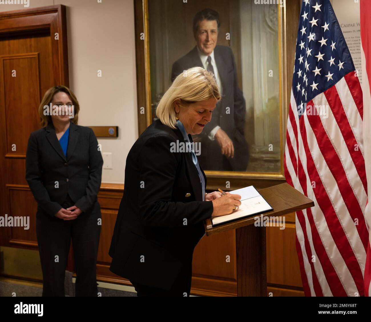 Austrian Federal Minister of Defense Klaudia Tanner signs a guestbook ...