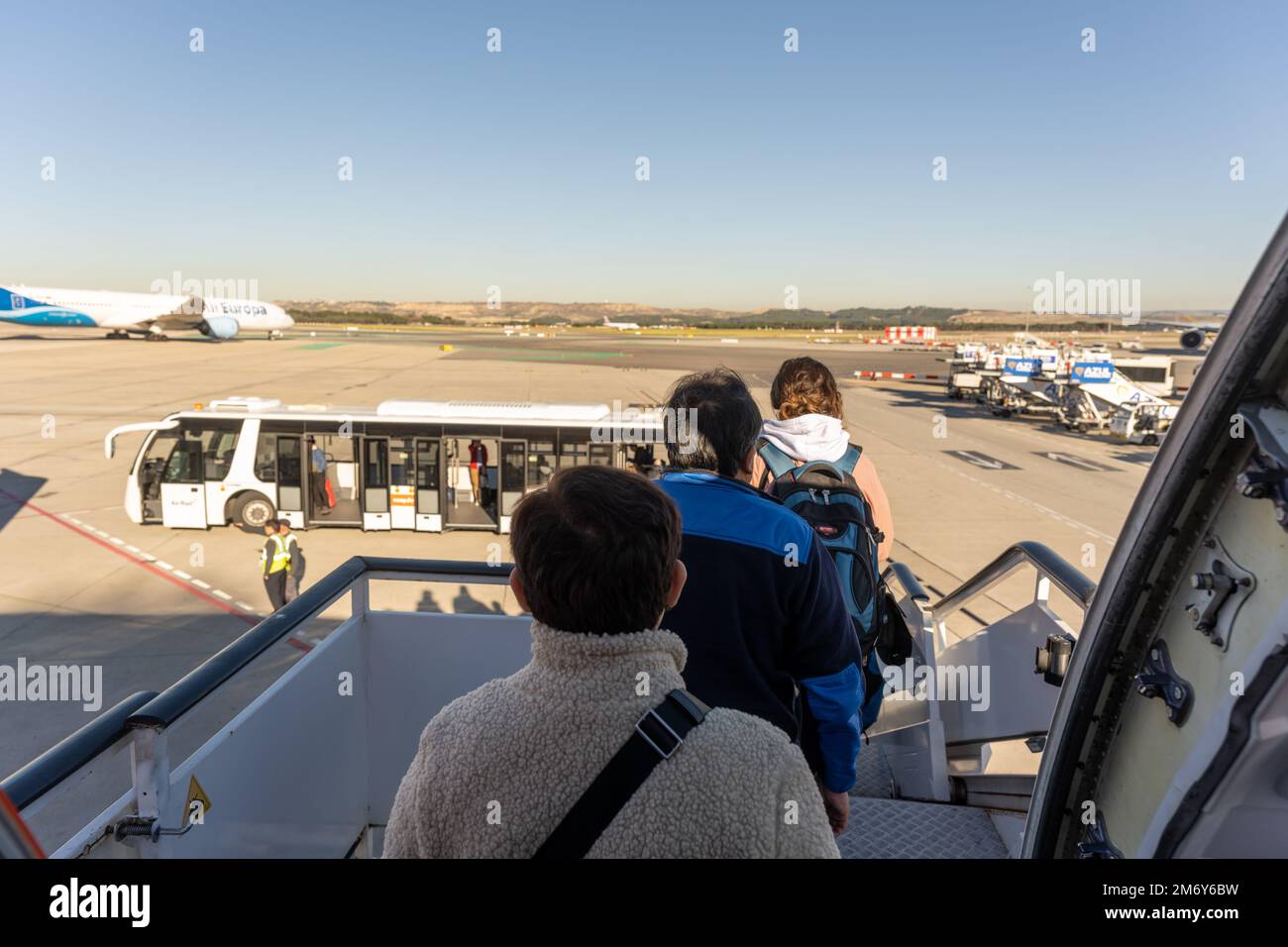 passengers disembarking from plane Stock Photo - Alamy