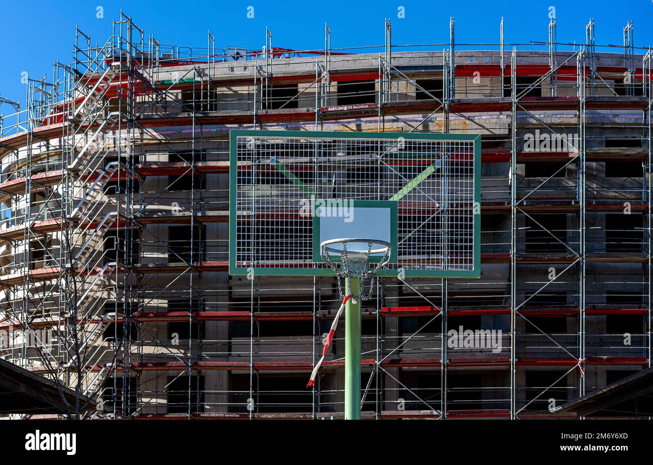 Basketball Hoop In Front Of Scaffolded New Building, Berlin, Germany ...