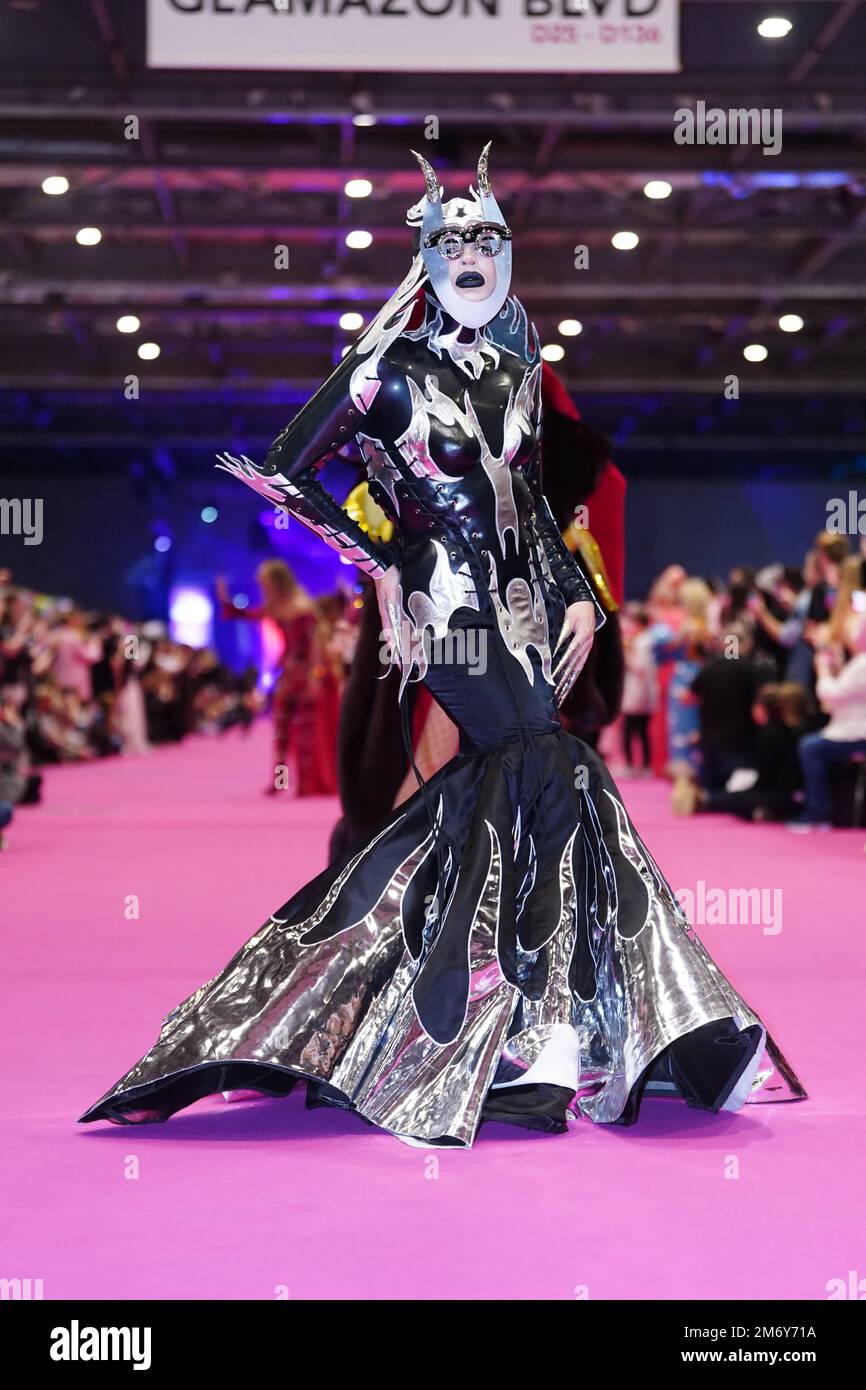 Drag queens take part in a catwalk show during the official opening of at RuPaul's DragCon UK ...
