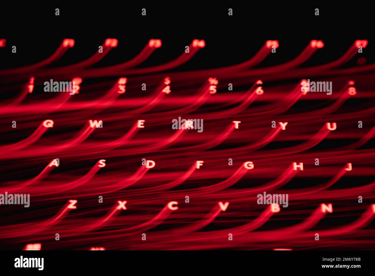 Light painting keyboard letters. Beautiful colorful background. Long ...