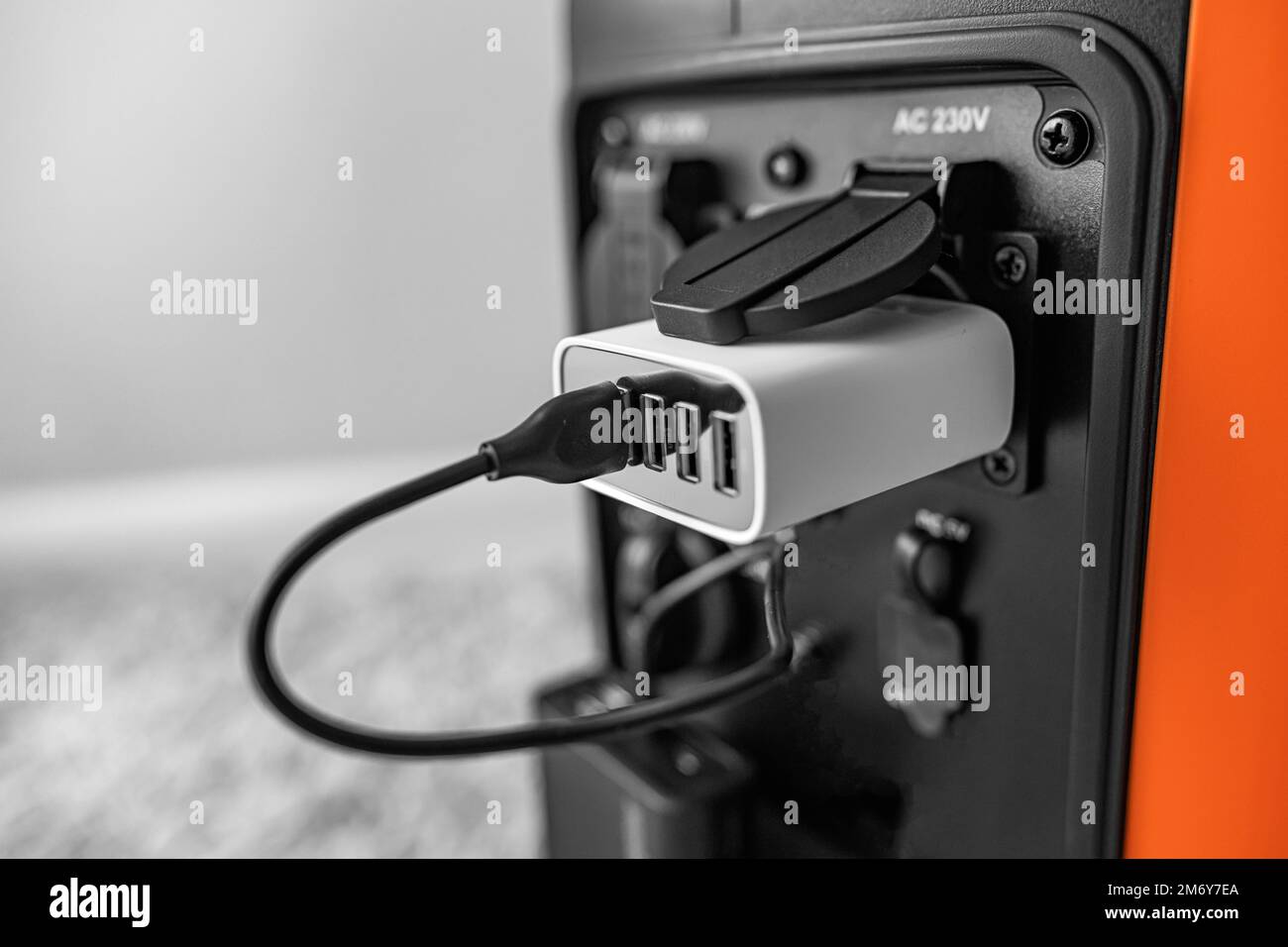 Inverter generator charges the power bank battery Stock Photo - Alamy