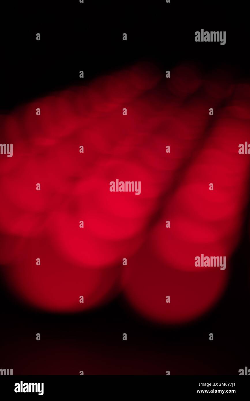 Red bokeh.Beautiful red wallpaper.Light painting.Blurred red background ...