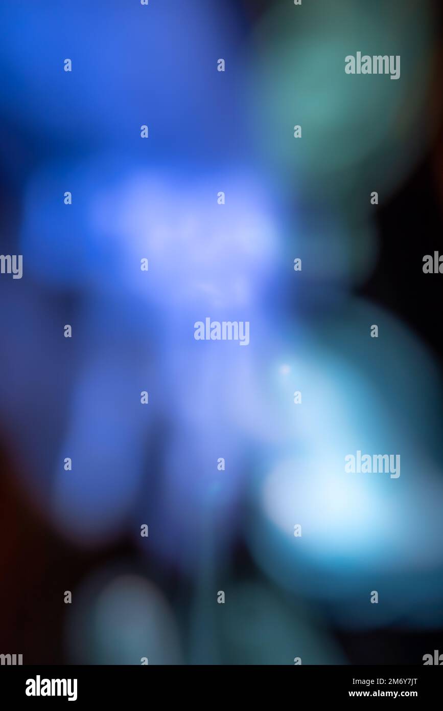 Beautiful blue background.Long exposure light painting.Blue neon ...