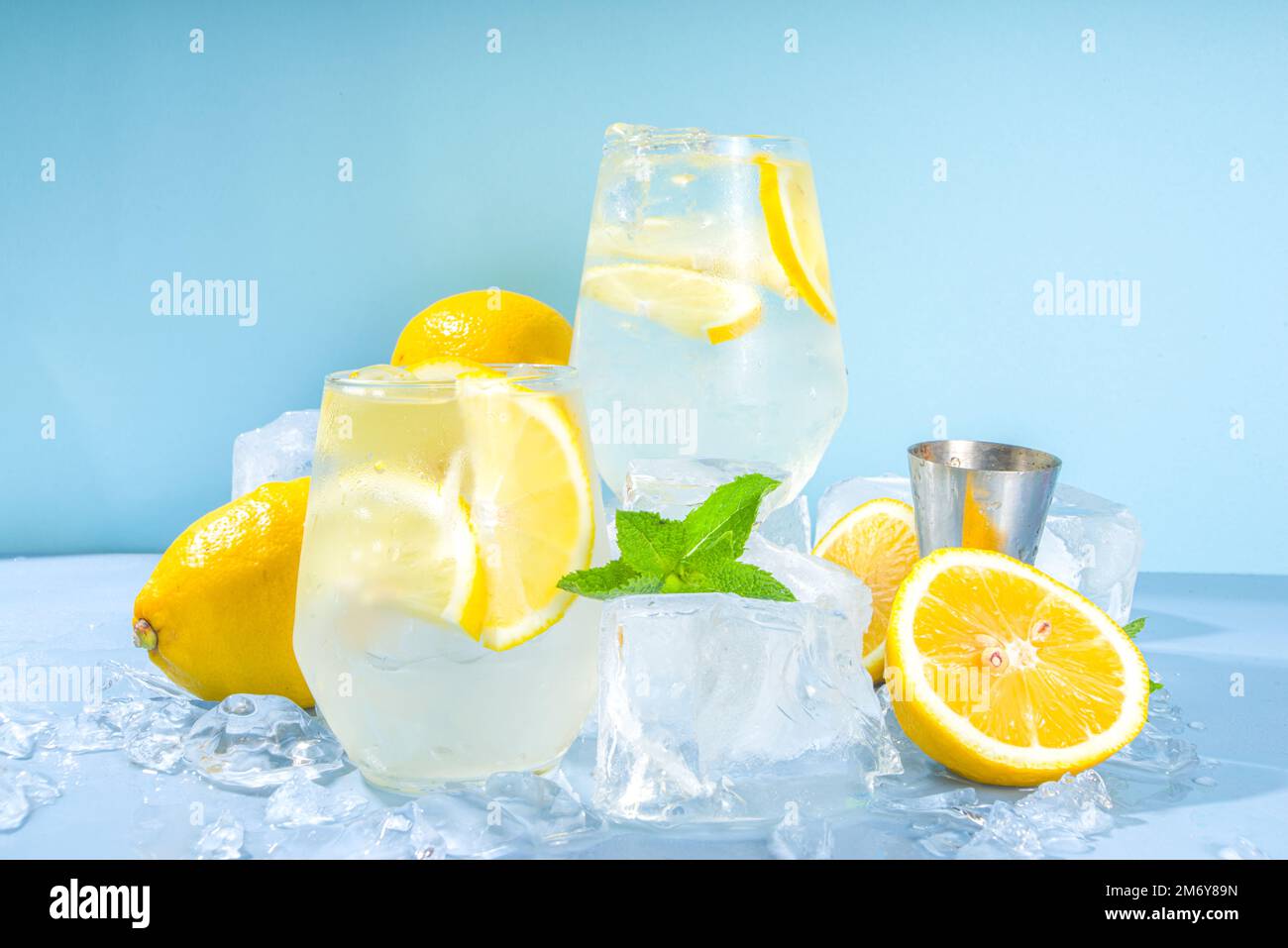 Traditional summer cold refreshing cocktail lemonade, with lemon slices ...