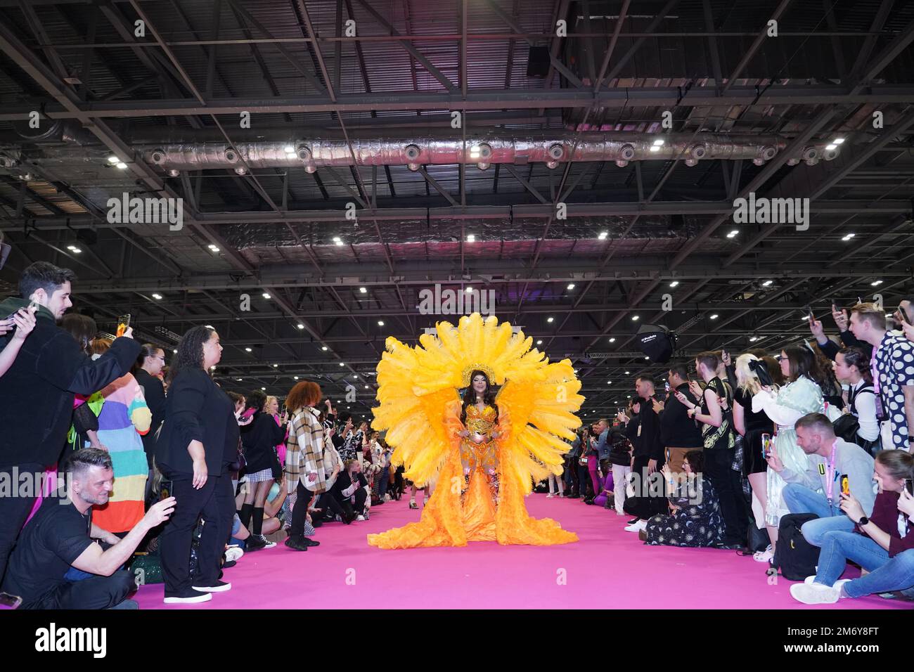 Drag queens take part in a catwalk show during the official opening of at RuPaul's DragCon UK ...