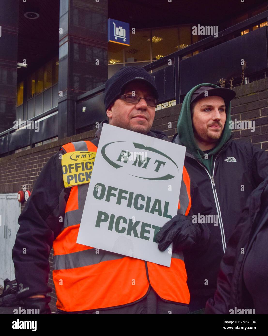 London, England, UK. 6th Jan, 2023. Rail workers stand at the RMT (Rail ...