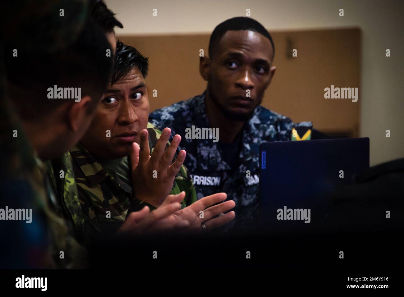 A Belize Defence Force member (left) and a Jamaica Defence Force member (right), participate in ...