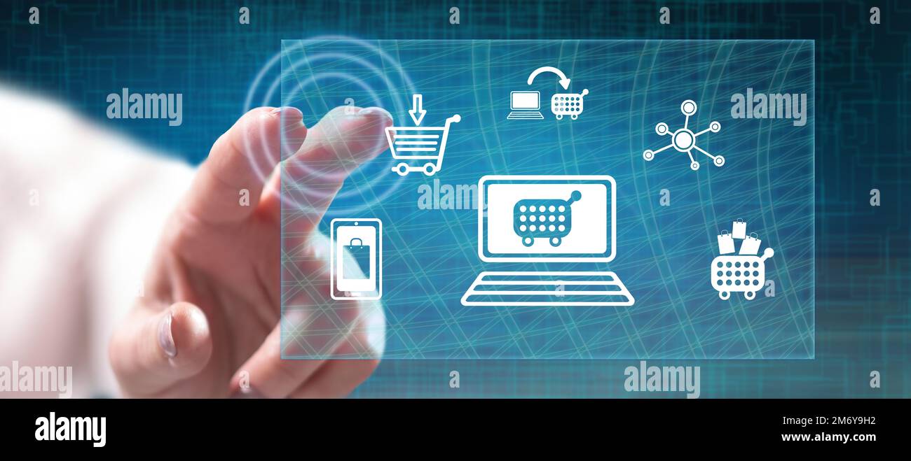 Woman touching an online shopping concept on a touch screen with her ...