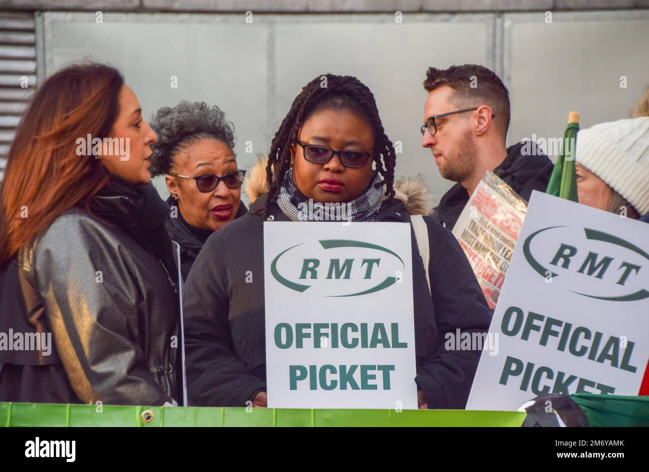 London, England, UK. 6th Jan, 2023. Rail workers stand at the RMT (Rail ...