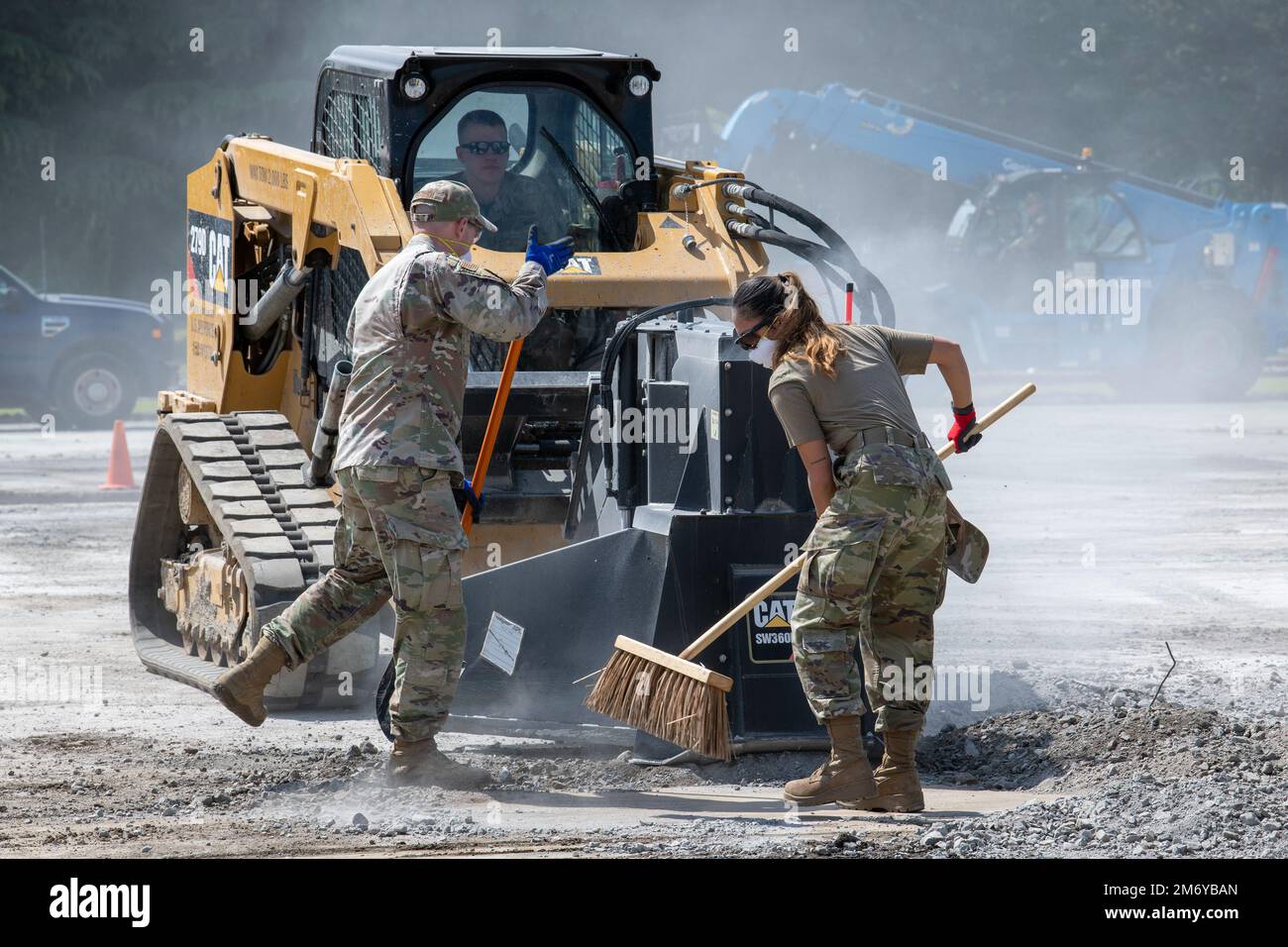 A rapid airfield damage repair team with the 374th Civil Engineer ...