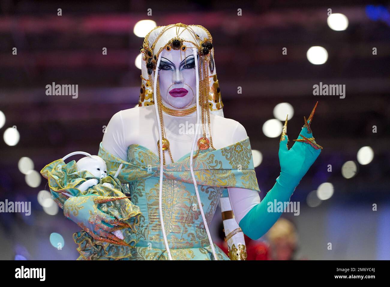 Drag queens take part in a catwalk show during the official opening of at RuPaul's DragCon UK ...